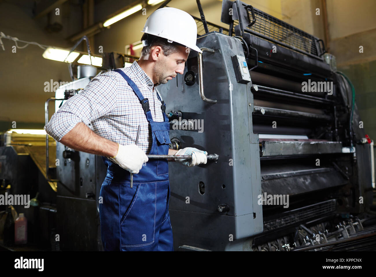 Repairing machine hi-res stock photography and images - Alamy