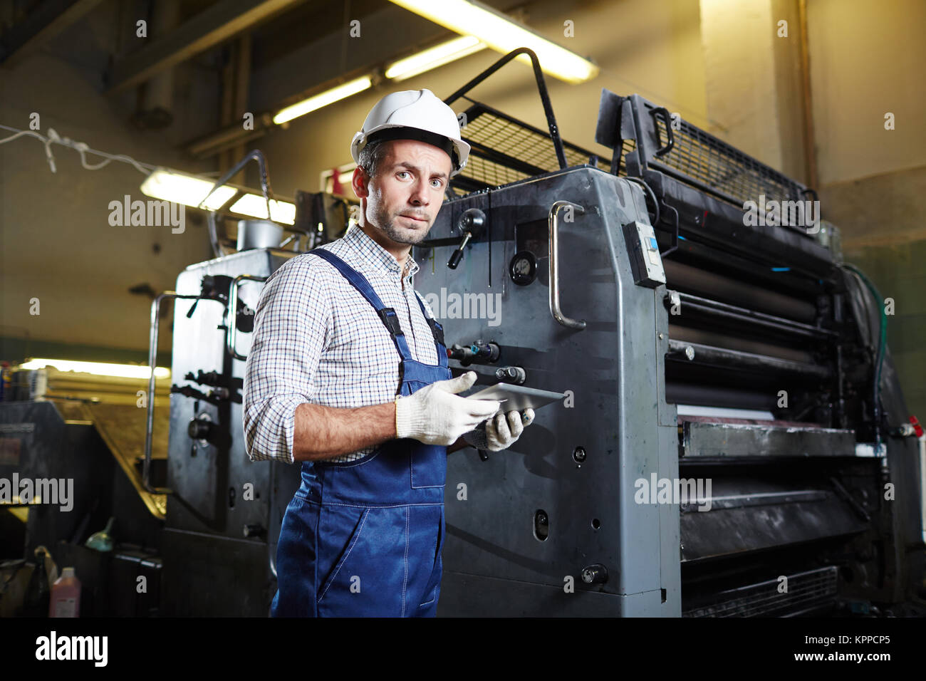 Worker with touchpad Stock Photo - Alamy