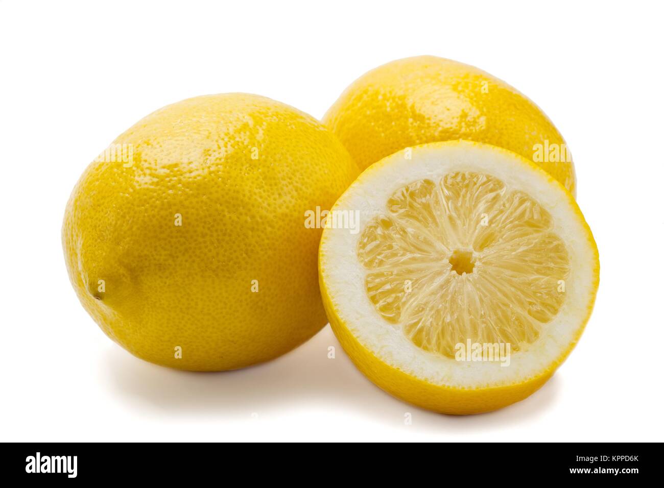 Half Lemon Grouped with Two Lemons Stock Photo - Alamy