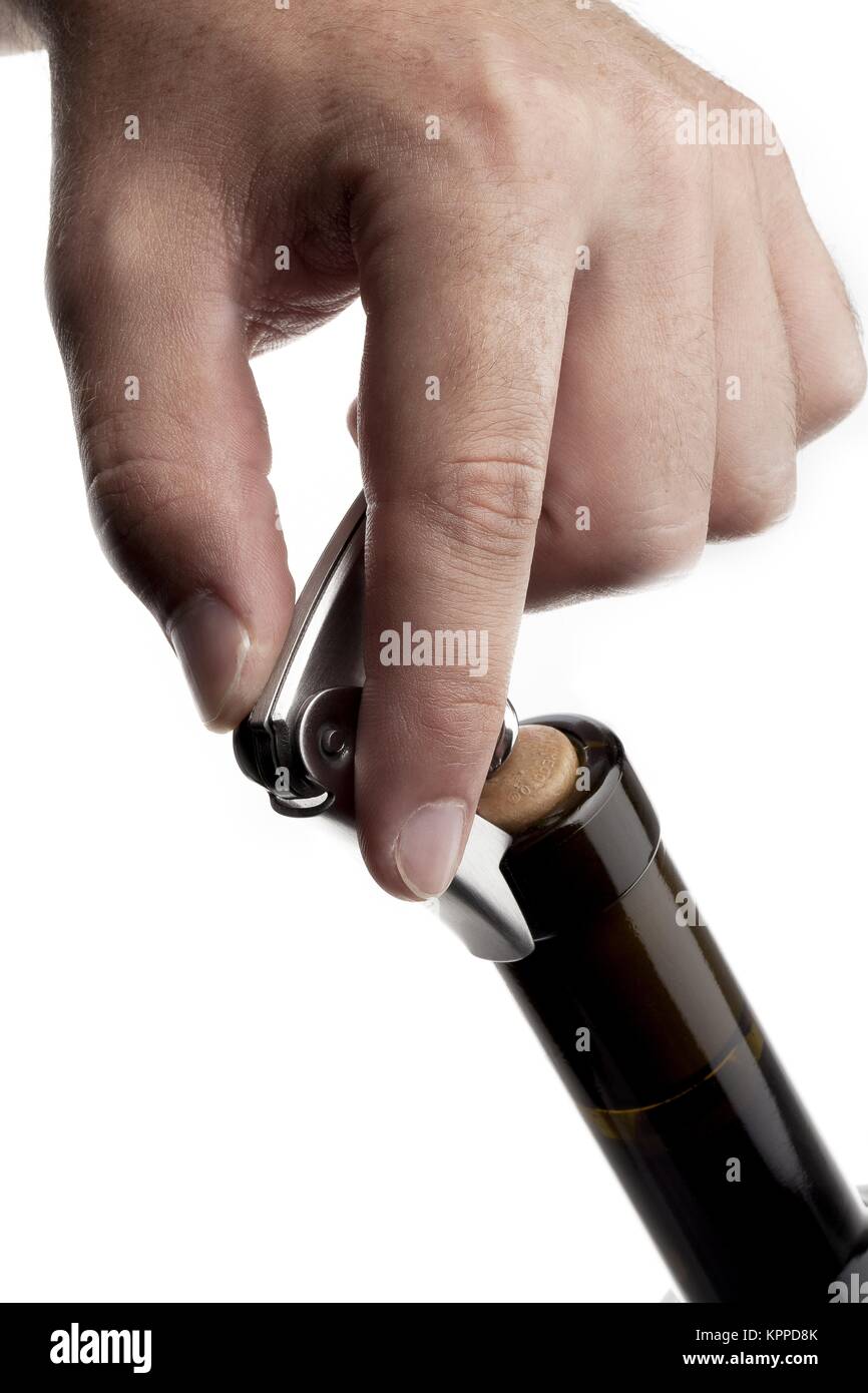 hand opening bottle of wine Stock Photo - Alamy