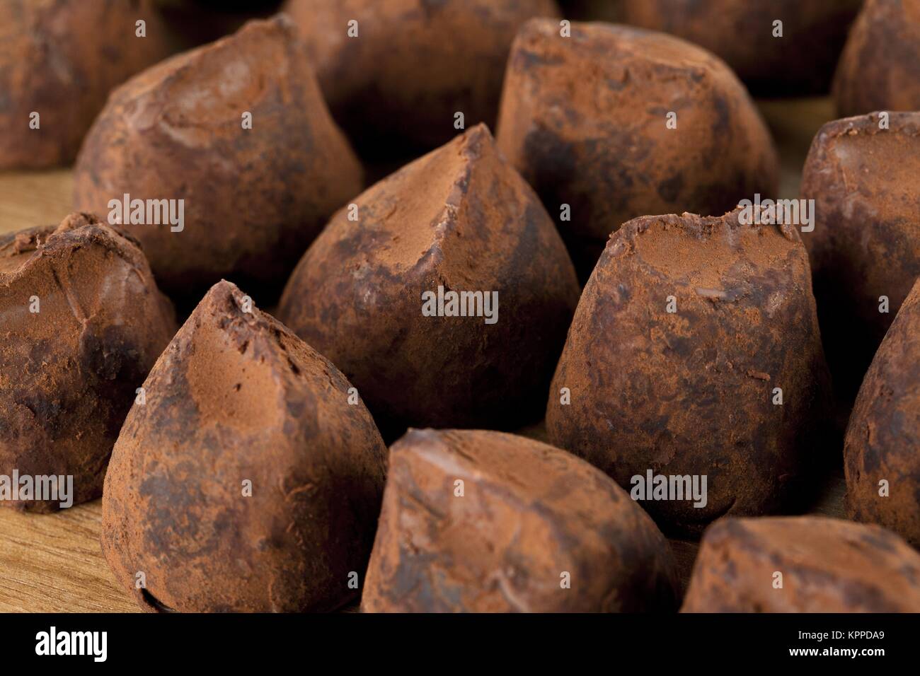 heap of chocolate candies close up Stock Photo - Alamy