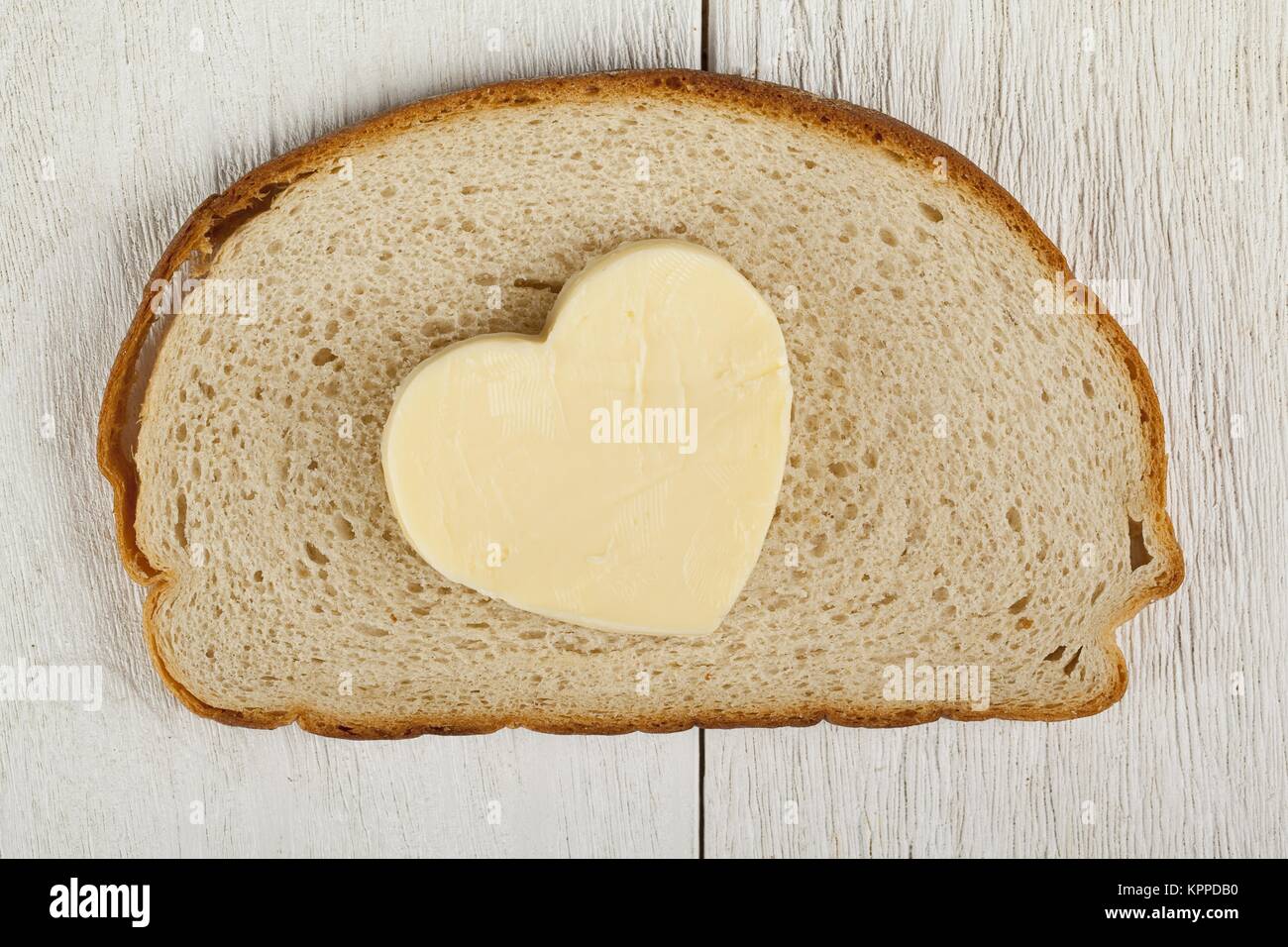 heart shaped butter on bread Stock Photo - Alamy
