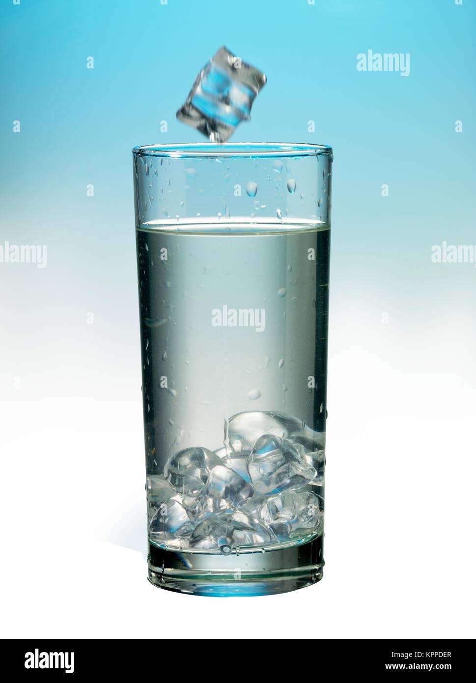ice cubes in a glass of water Stock Photo - Alamy