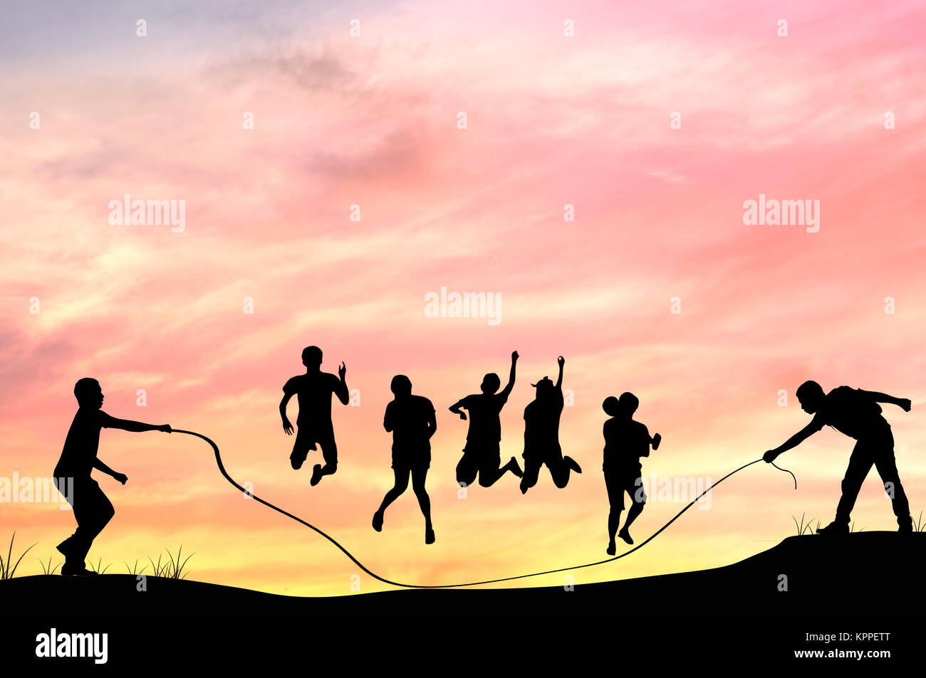 Silhouette of grooup people rope jumping with in twilight, teamwork and ...