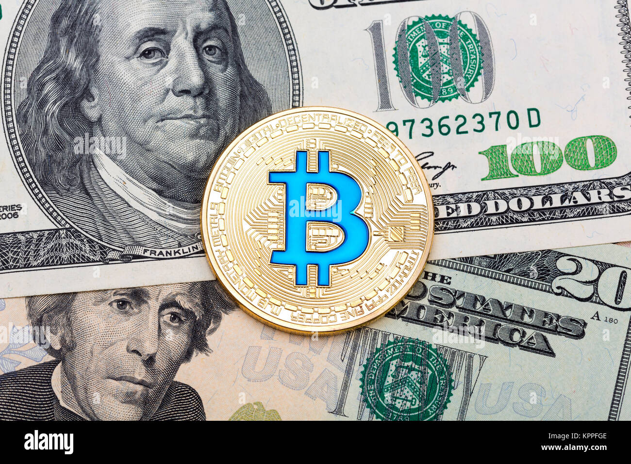 Close up of golden blue bitcoin on US dollars background Stock Photo ...