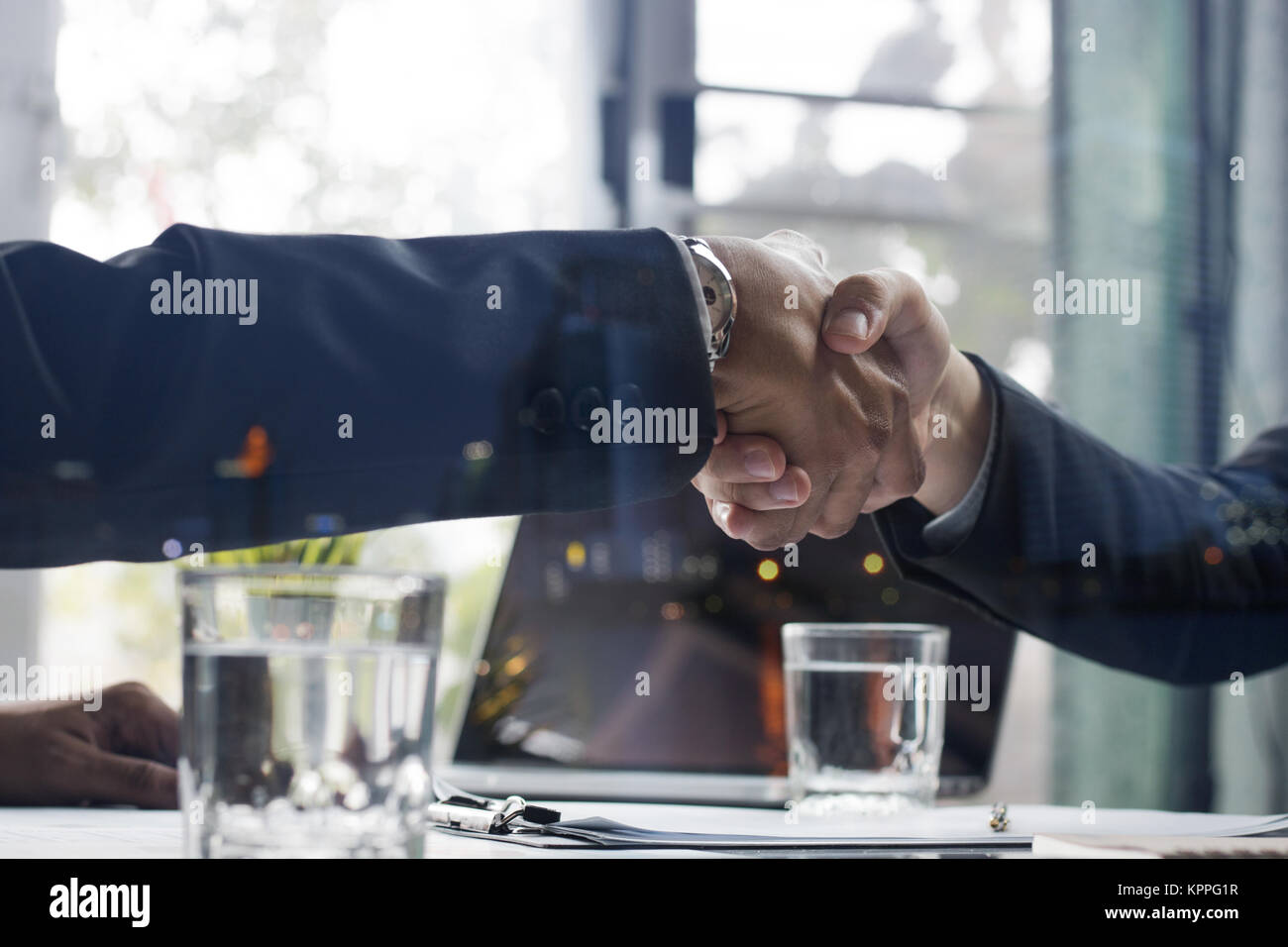negotiations and business success concept, businessmen shaking hands or ...