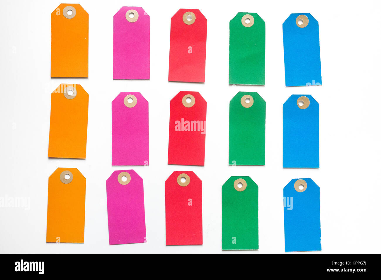 Colorful labels in orange, pink, red, green and blue on a white ...
