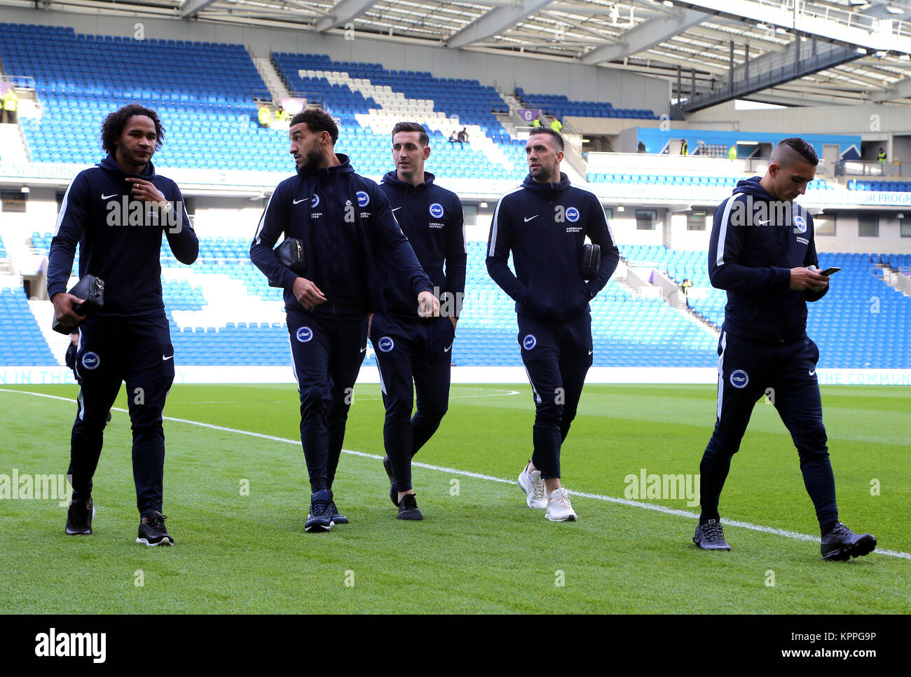 Brighton & Hove Albion's Izzy Brown (left), Connor Goldson, Lewis Dunk ...