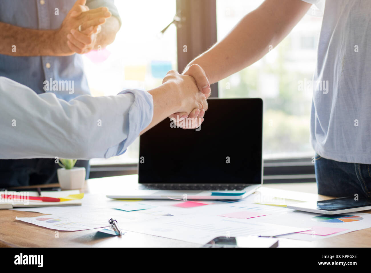 Business people shaking hand to cooperate and deal in business ...