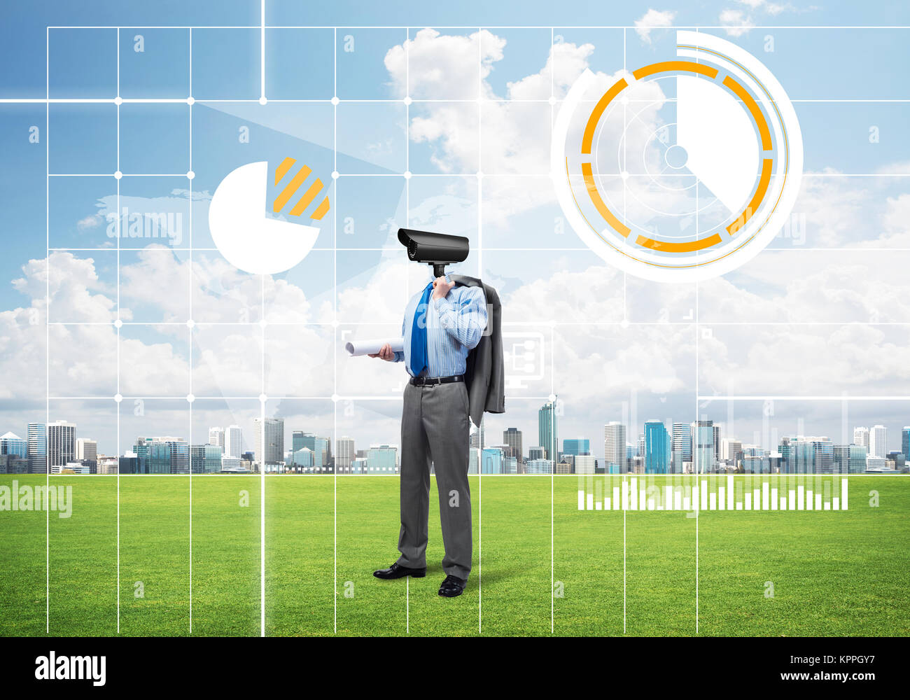 Camera headed man standing on green grass against modern cityscape ...