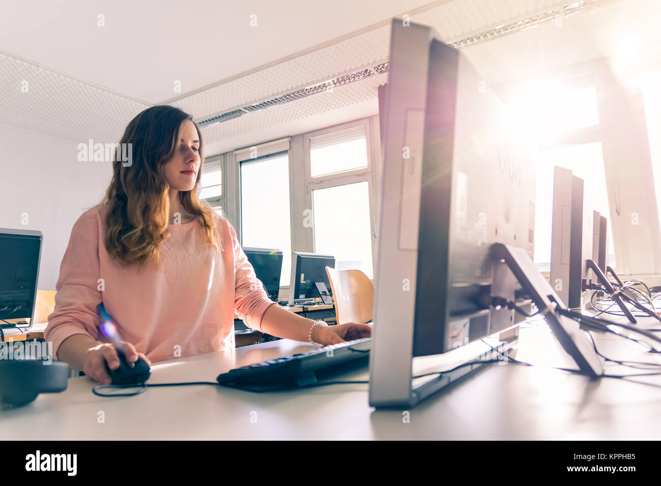 Young Student Girl Female in Bright Computer Lab University Classroom ...