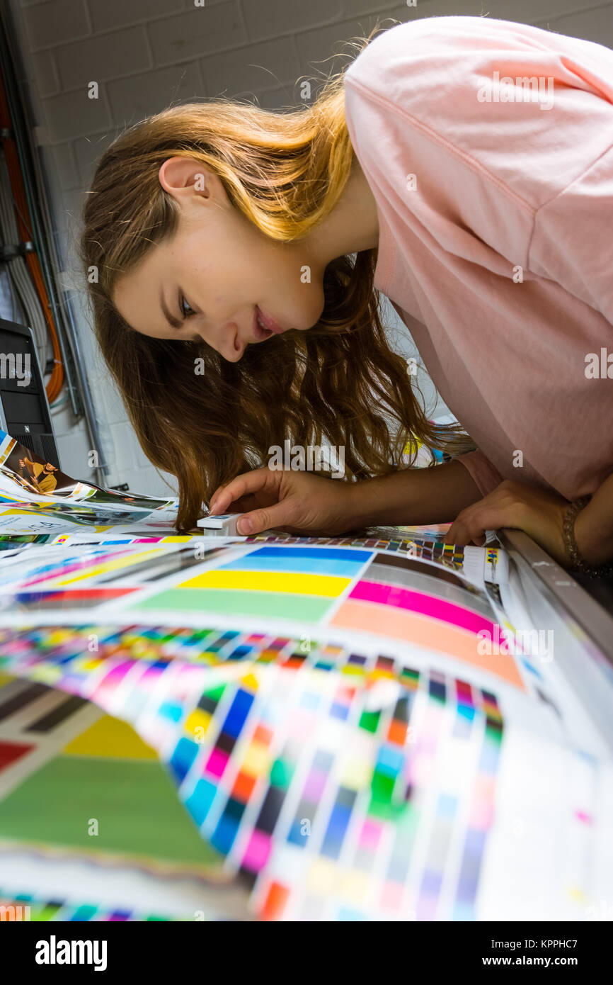 Young Female Engineer Printing Specialist Measuring Checking Colors ...