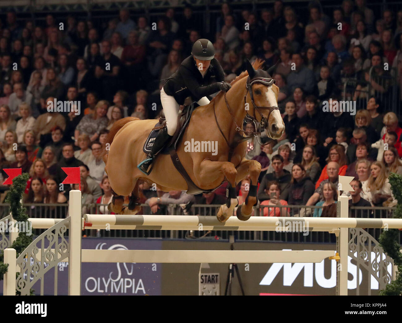 Britain's Laura Renwick riding Top Dollar VI competes in the Christmas ...