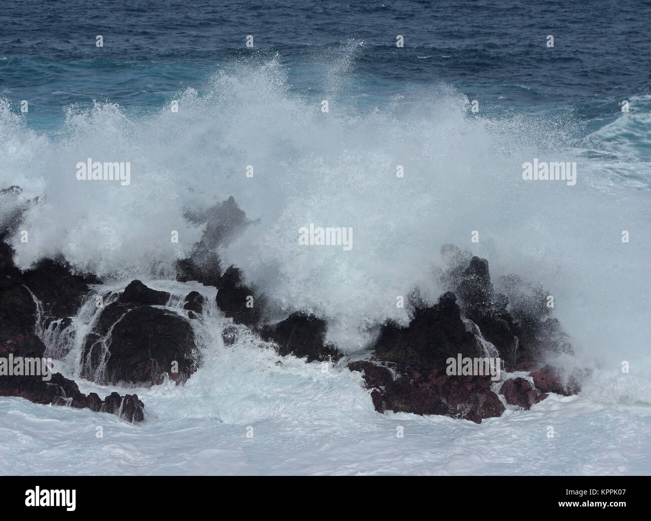 Rocky reef in the surf Stock Photo - Alamy