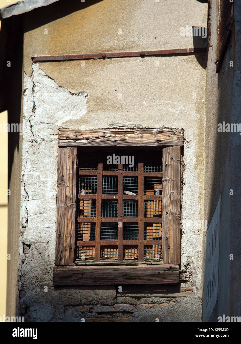 Old window with metal grating Stock Photo - Alamy