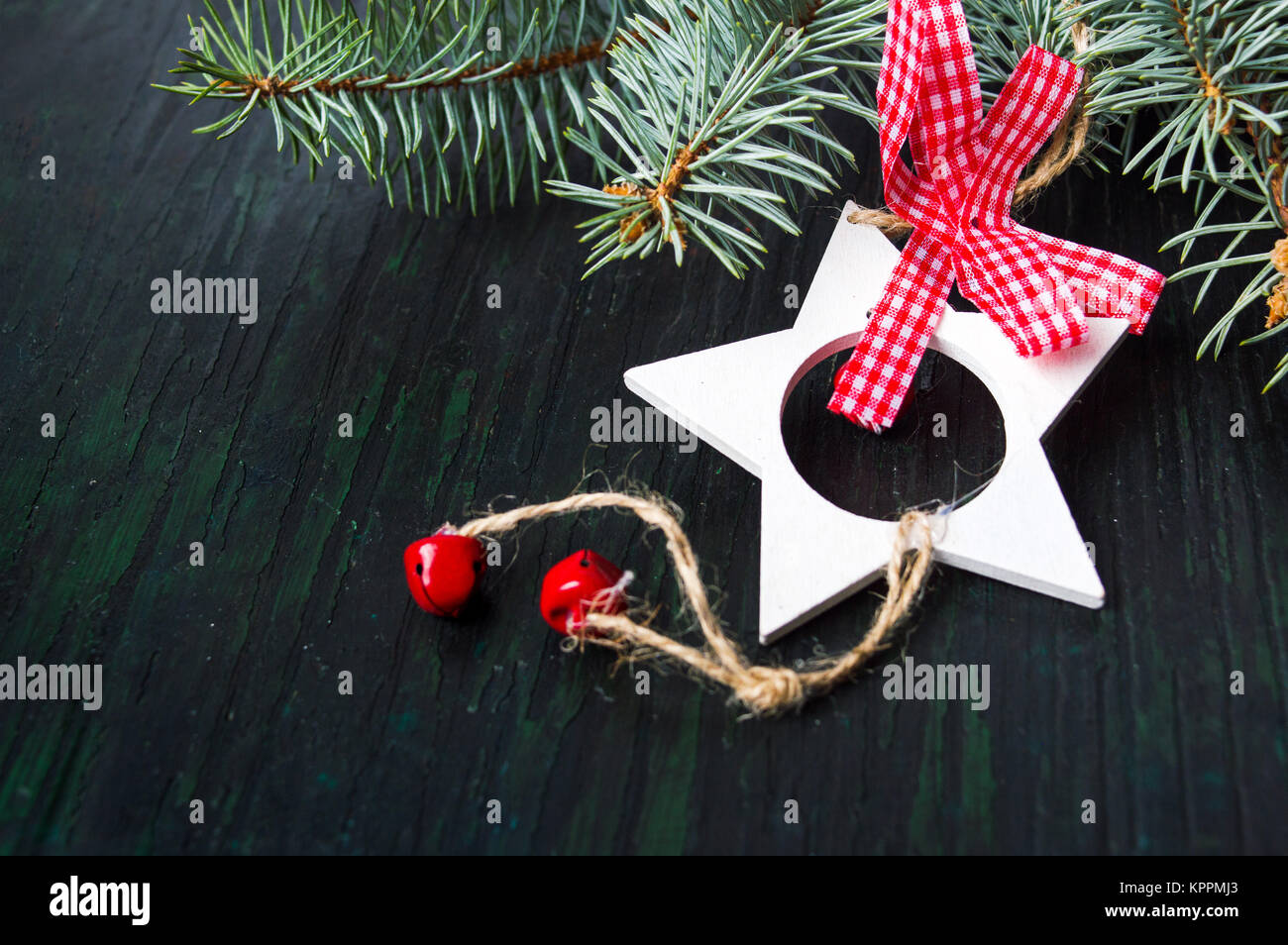 Festive star shape decorations on dark wooden background Stock Photo ...