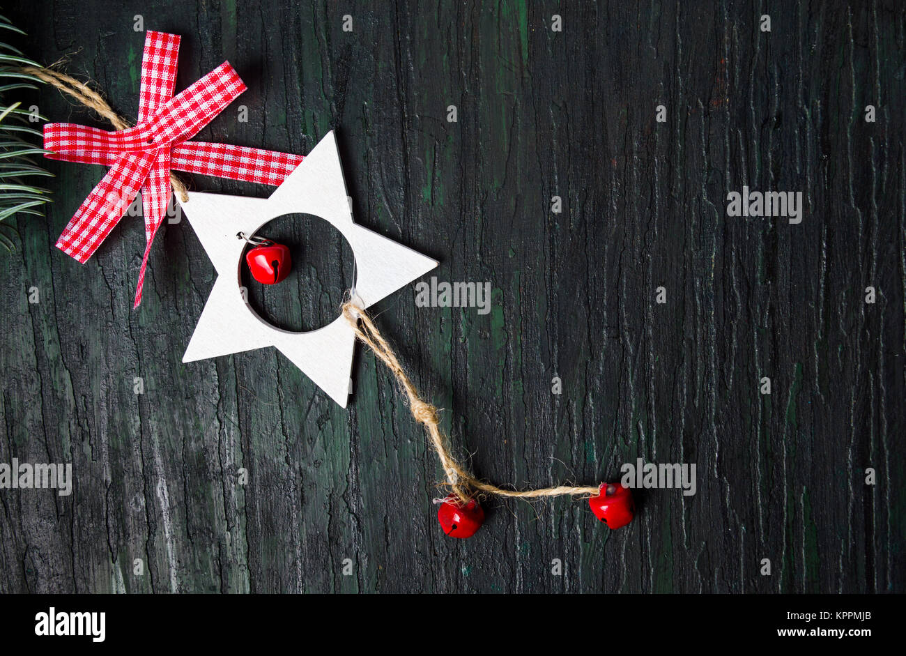Festive star shape decorations on dark wooden background Stock Photo ...