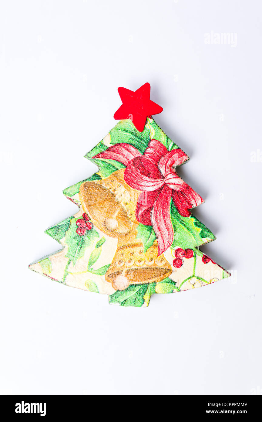 Decoupage Christmas tree decoration on white background Stock Photo - Alamy