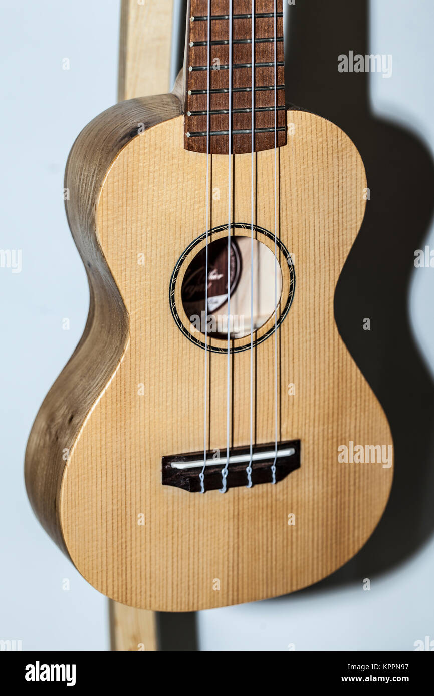 TIMPLE INSTRUMENTS for sale hanging in a music shop Stock Photo - Alamy