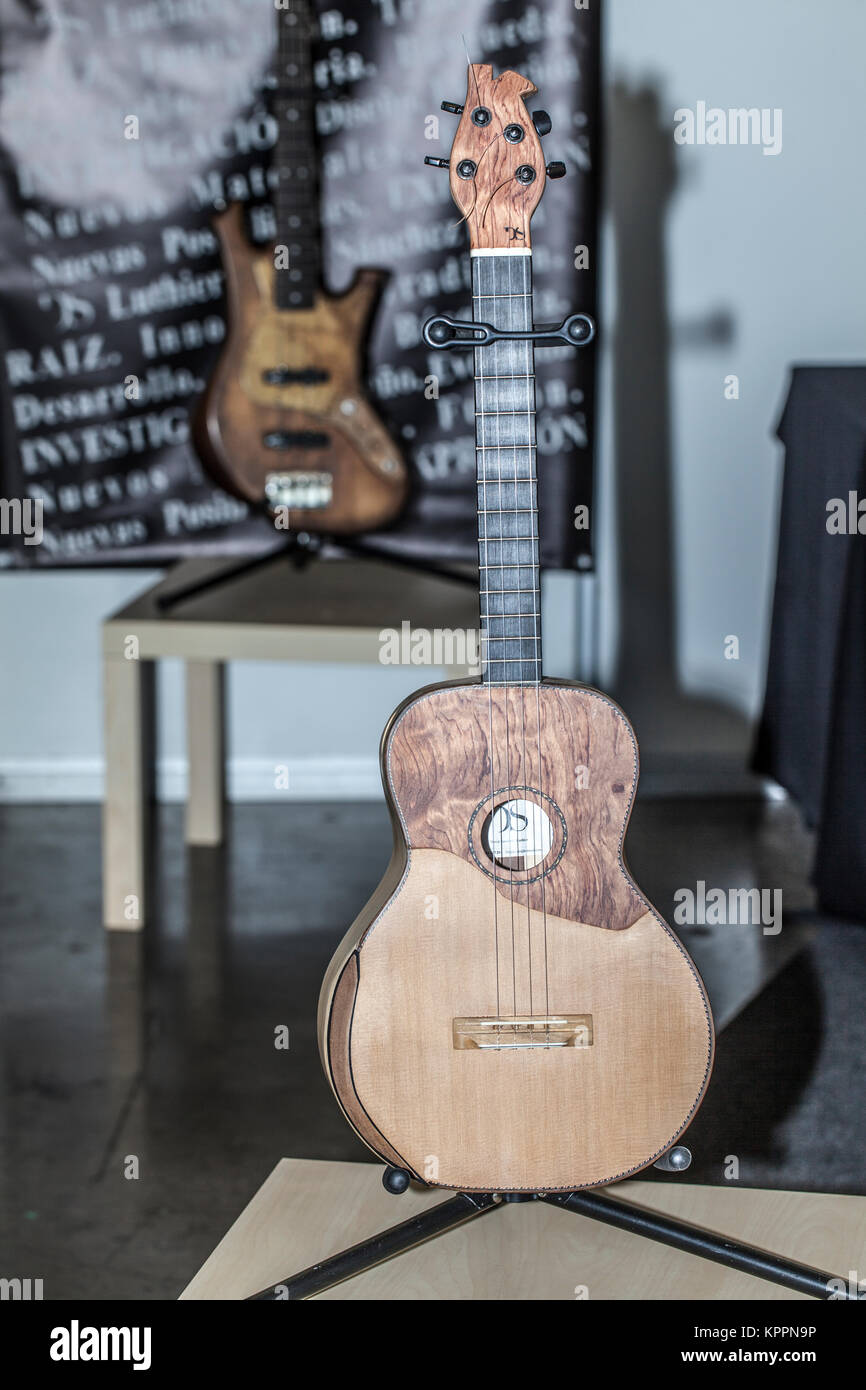 TIMPLE INSTRUMENTS for sale hanging in a music shop Stock Photo - Alamy
