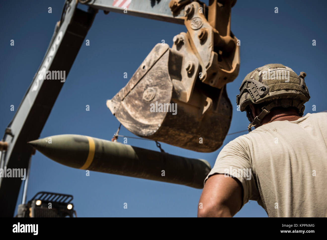 An explosive ordnance disposal technician, assigned to the 332nd ...