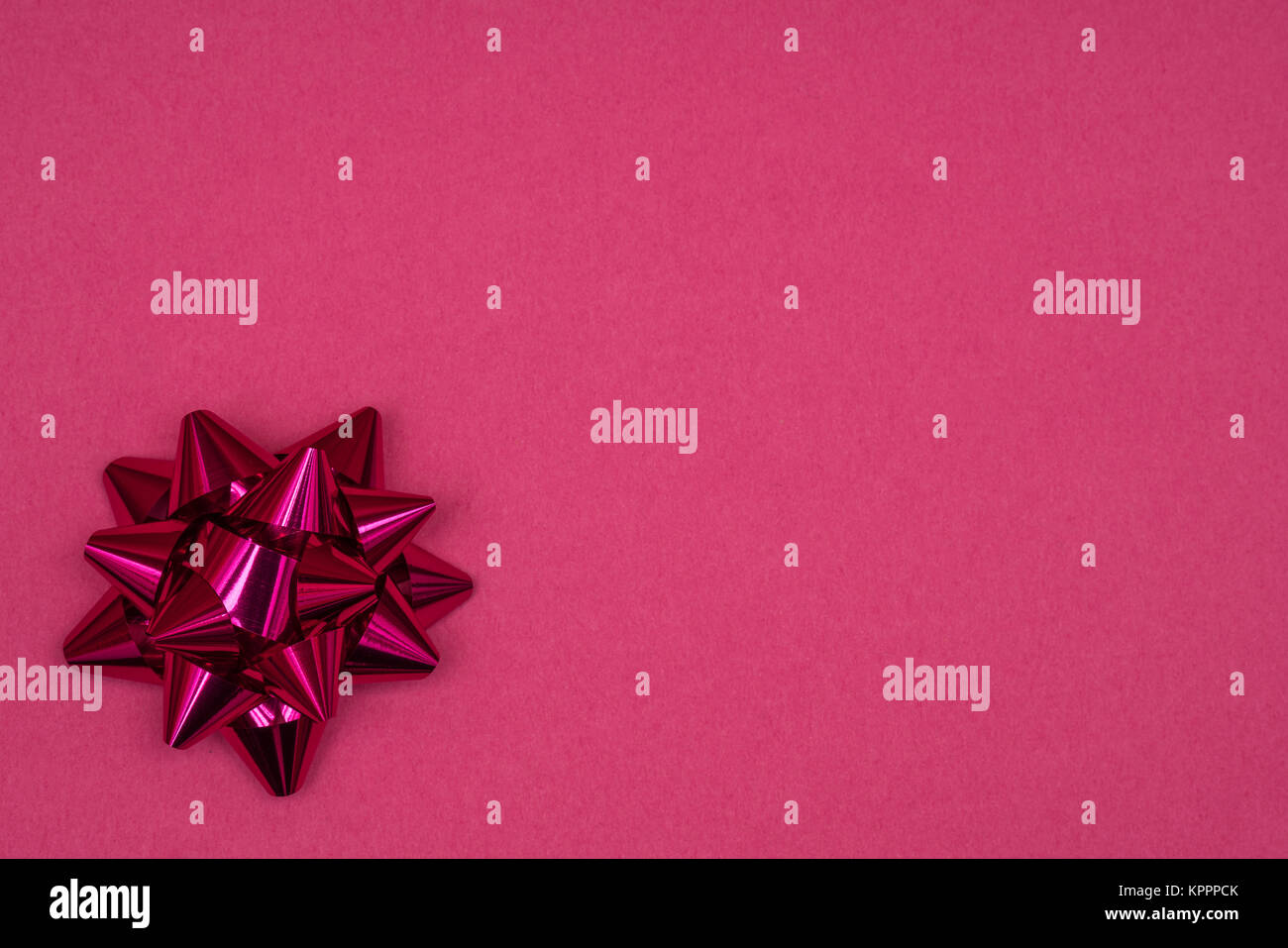 blue bow on a colored background Stock Photo - Alamy