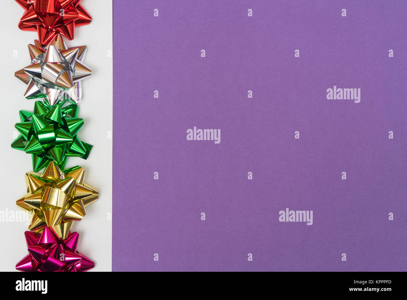 row of colored bows on a colored background Stock Photo - Alamy
