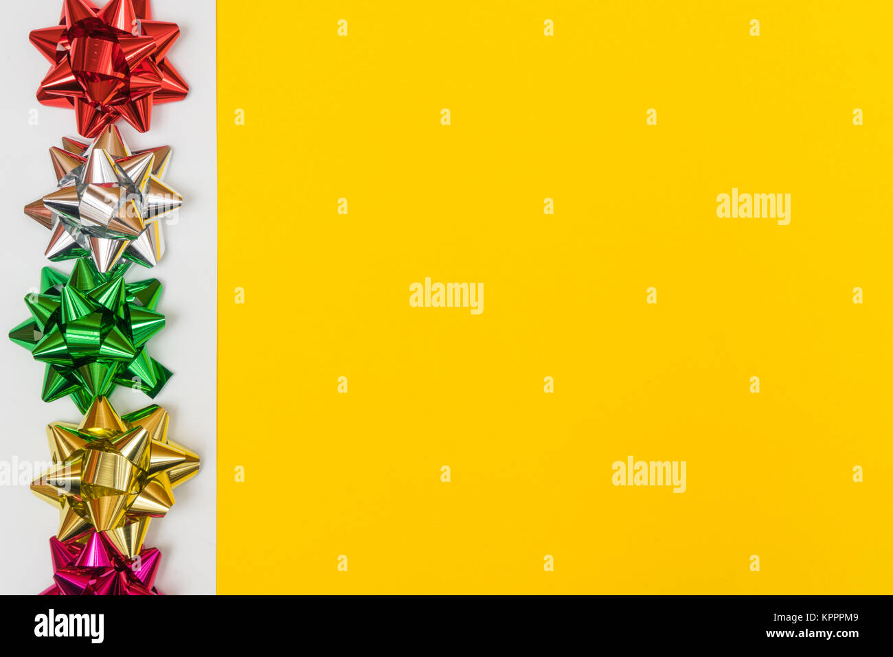 row of colored bows on a colored background Stock Photo - Alamy