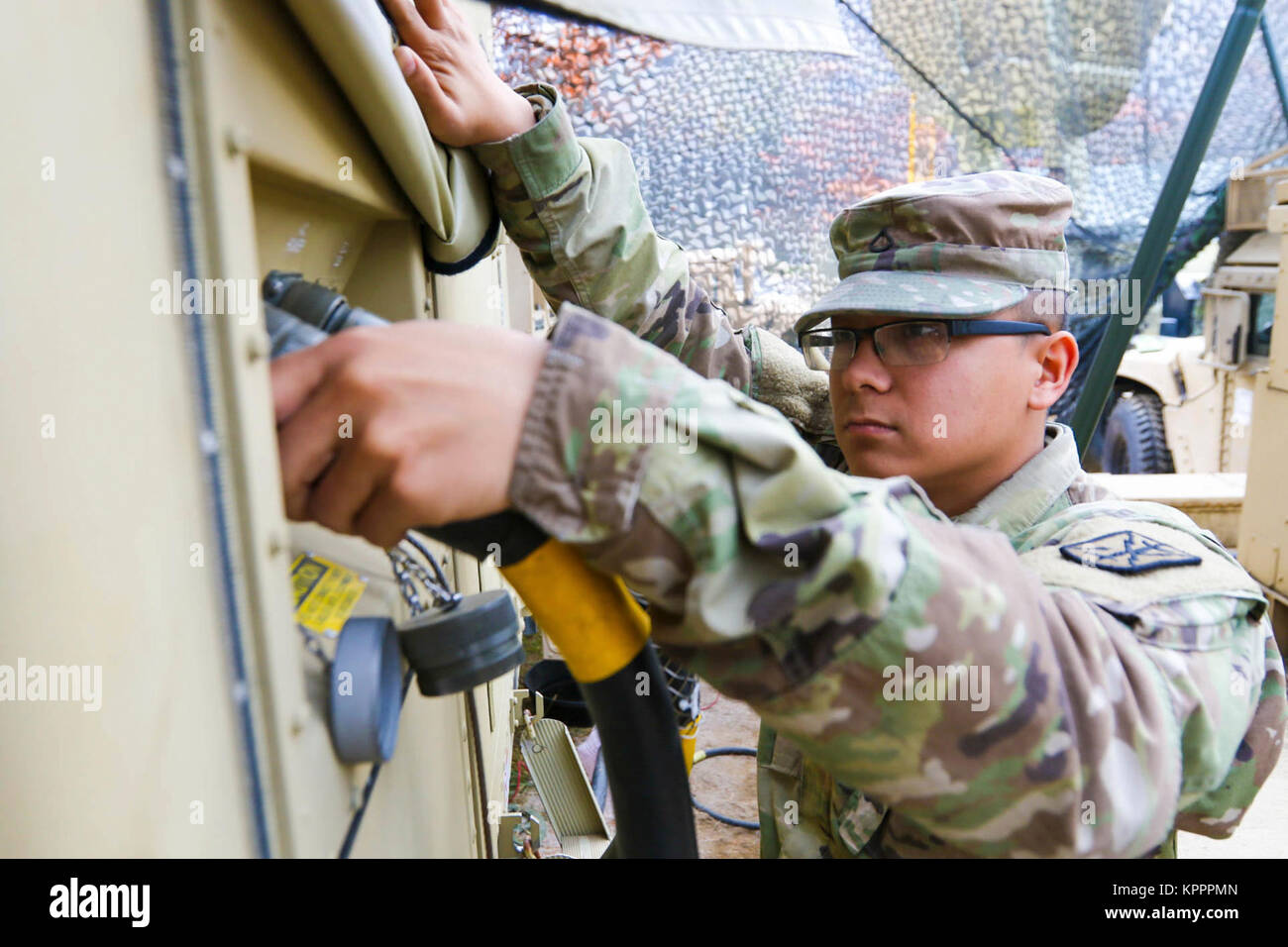 Pfc. Jonathan Broadbent, a nodal network systems operator/maintainer ...