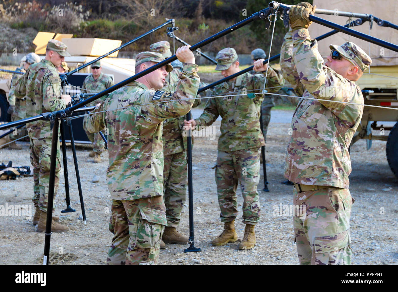 Soldiers from the 17th Field Artillery Brigade set up a tactical ...