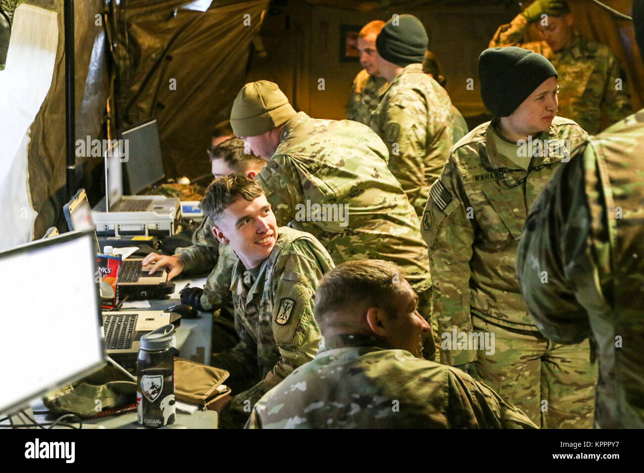 Soldiers from the 17th Field Artillery Brigade set up a tactical ...