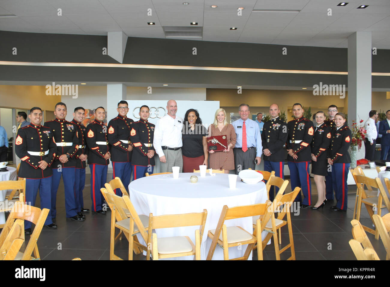 SAN ANTONIO, TX-Local dealership owner, Rick Cavender (center-right ...