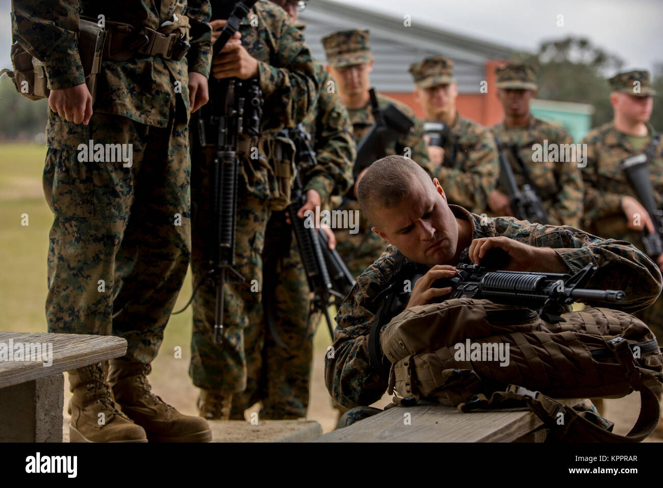 Sgt. Max Tackett, a primary marksmanship instructor with Marksmanship ...