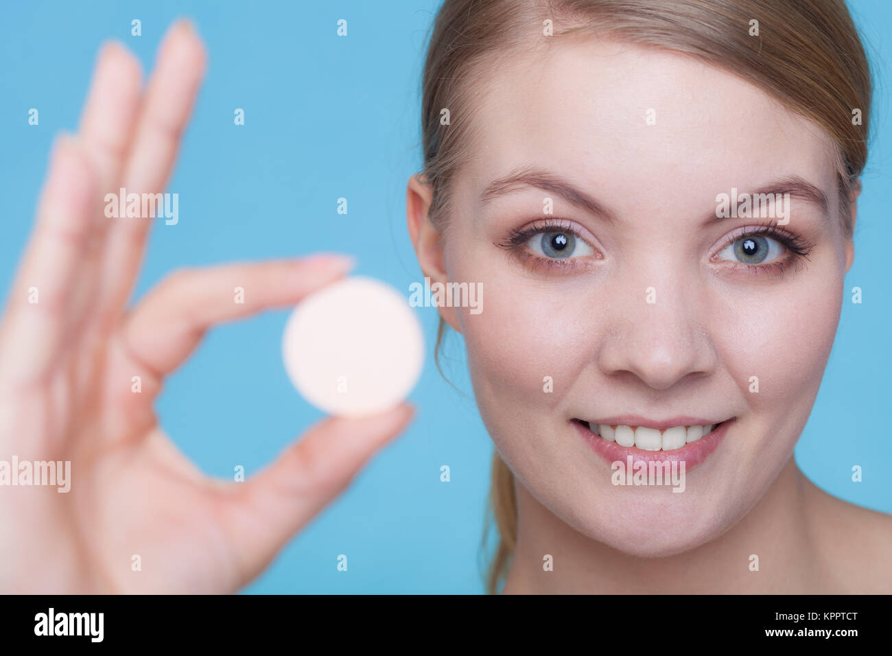 Vitamins, health, medicines. Woman holding behing her face big ...
