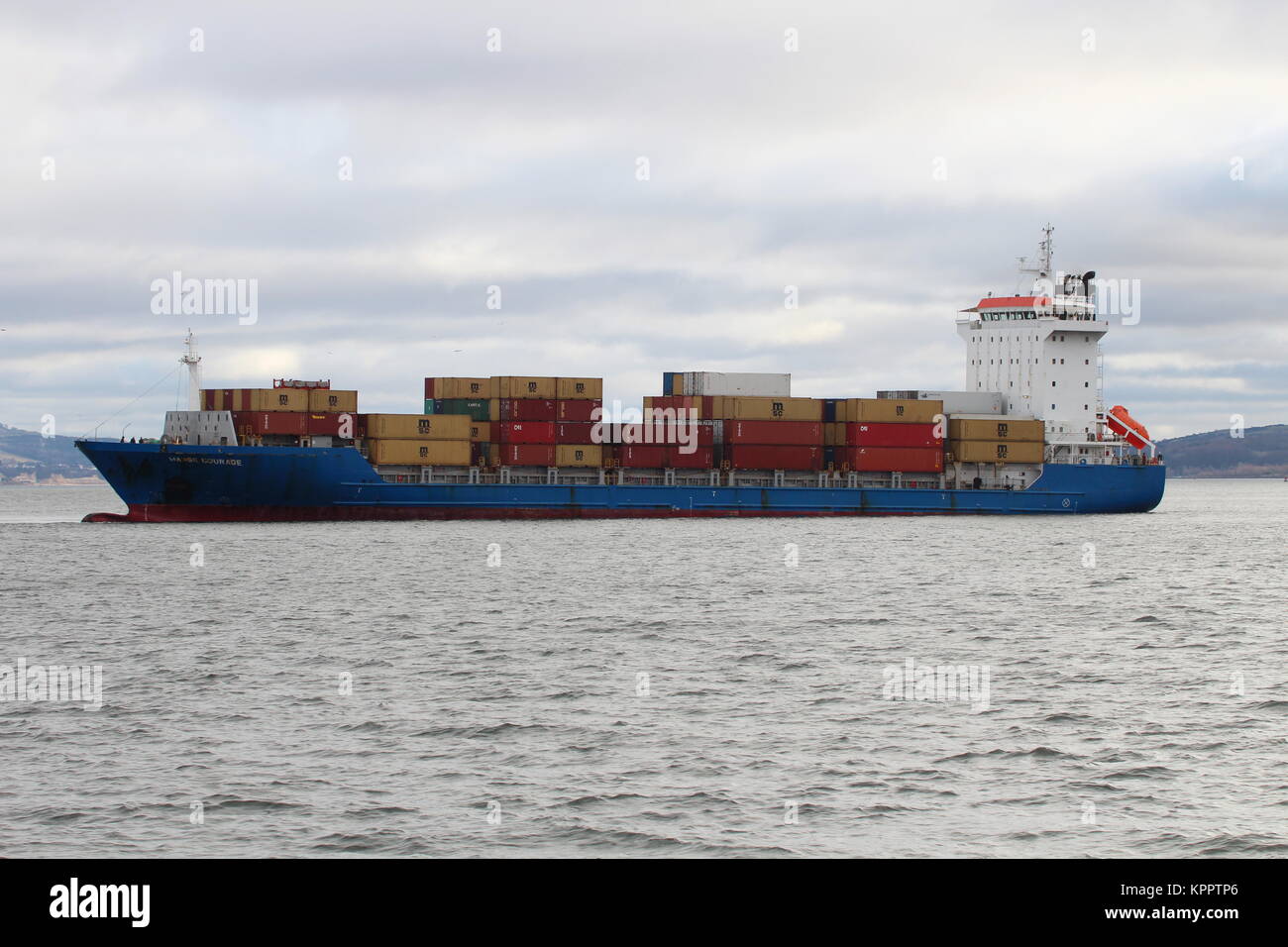 The container vessel Hanse Courage, manoeuvres into Greenock Ocean ...