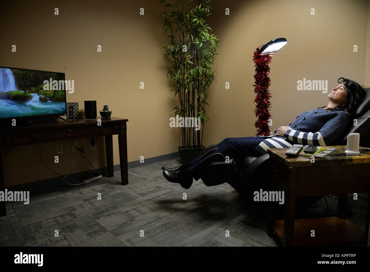 Lori Muzzana, 341st Missile Wing community support coordinator, lays in ...