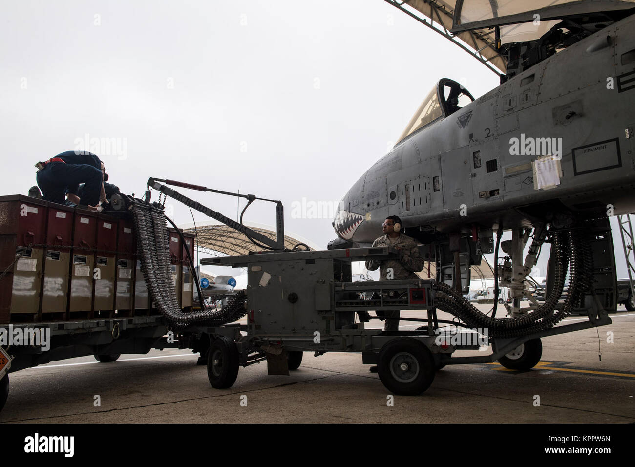 Airmen from the 23d aircraft maintenance unit use an Ammunition Loading ...