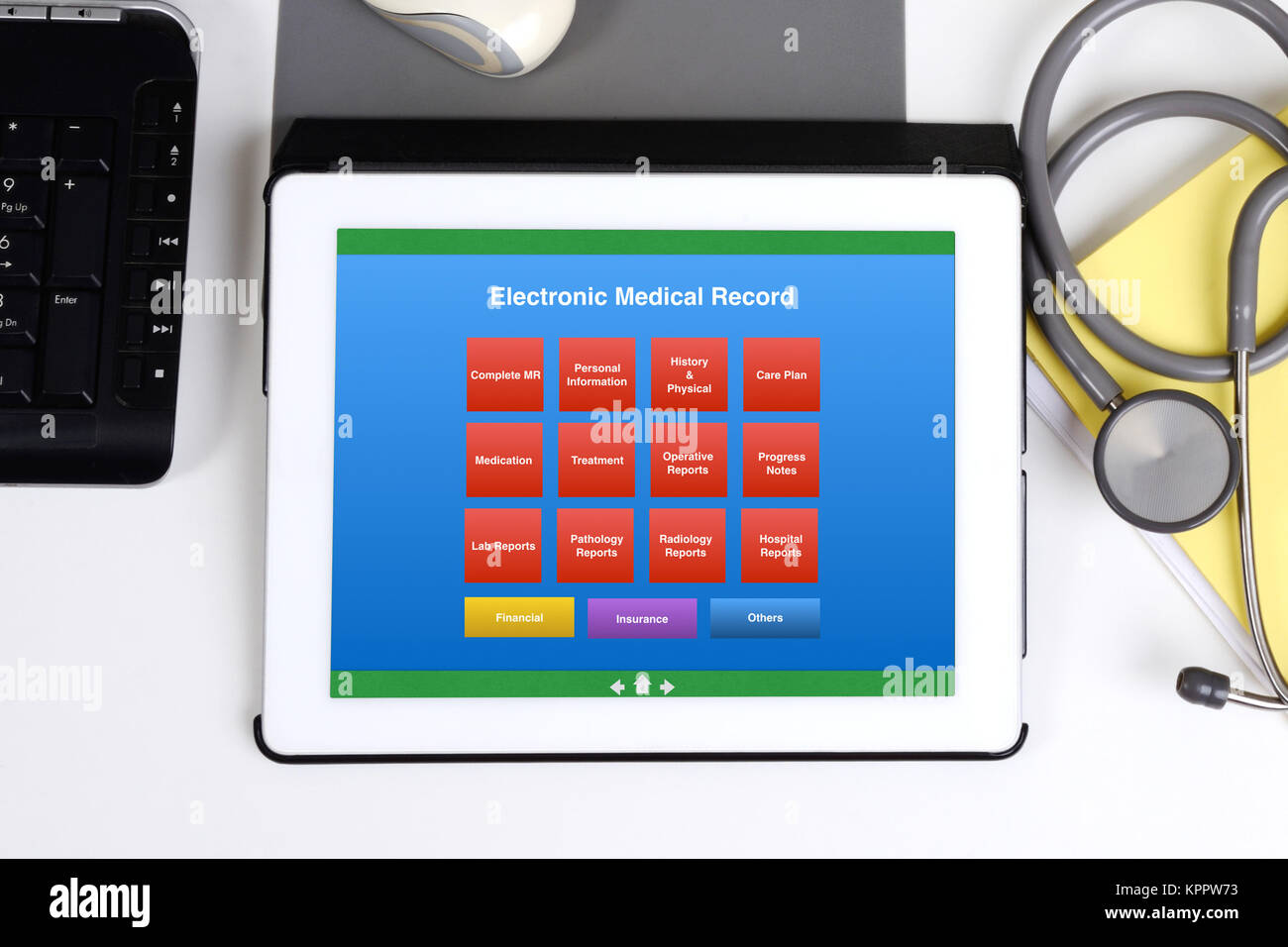 Electronic medical record system show on tablet computer screen on ...