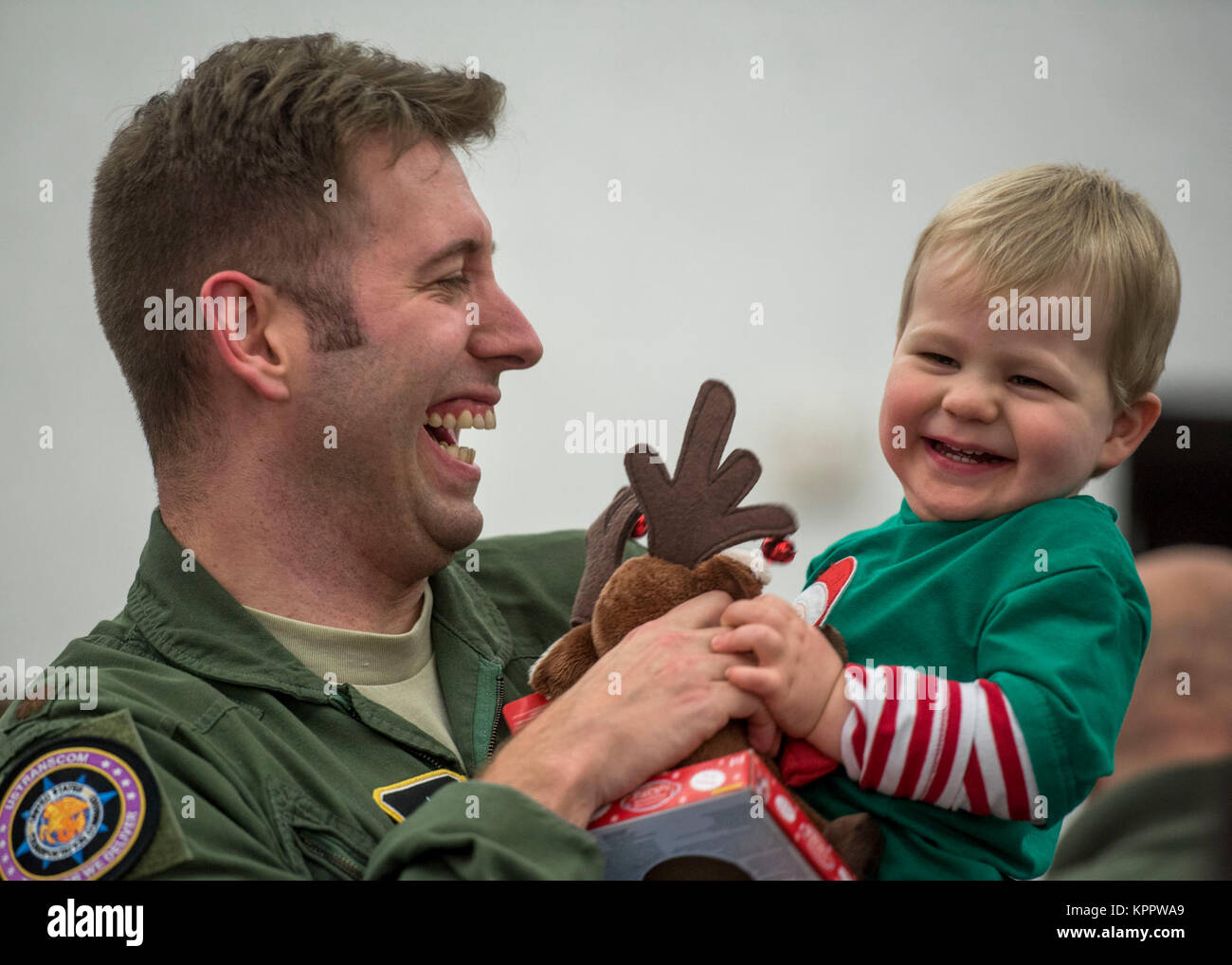 Maj. Keith Nordquist, U.S. Transportation Command, laughs with his son ...
