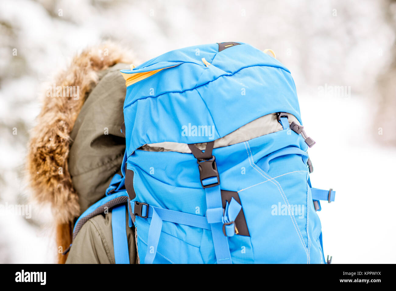 Backpack in the snowy forest Stock Photo - Alamy