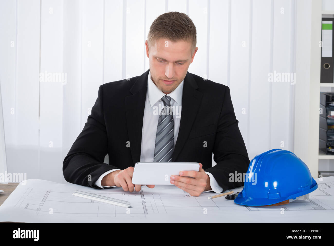 Young Male Architecture Using Digital Tablet Stock Photo - Alamy