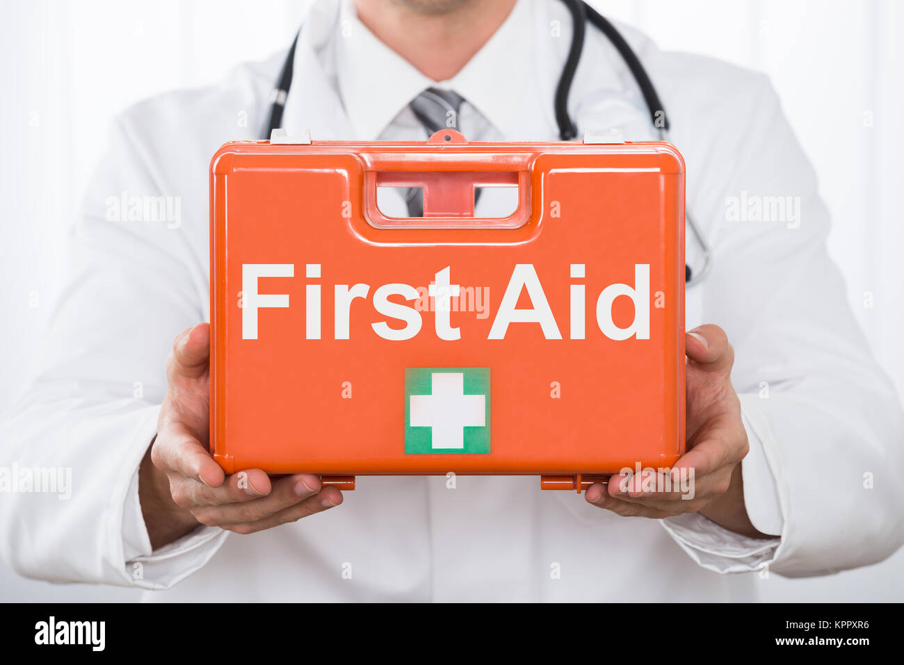 Doctor Hand Holding First Aid Kit Box Stock Photo - Alamy