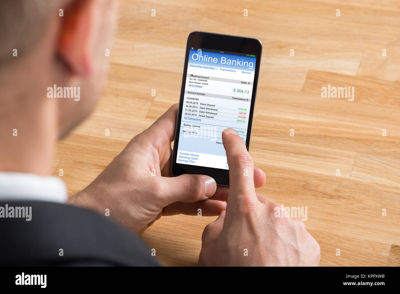 Businessman Using Online Banking On Cellphone Stock Photo - Alamy