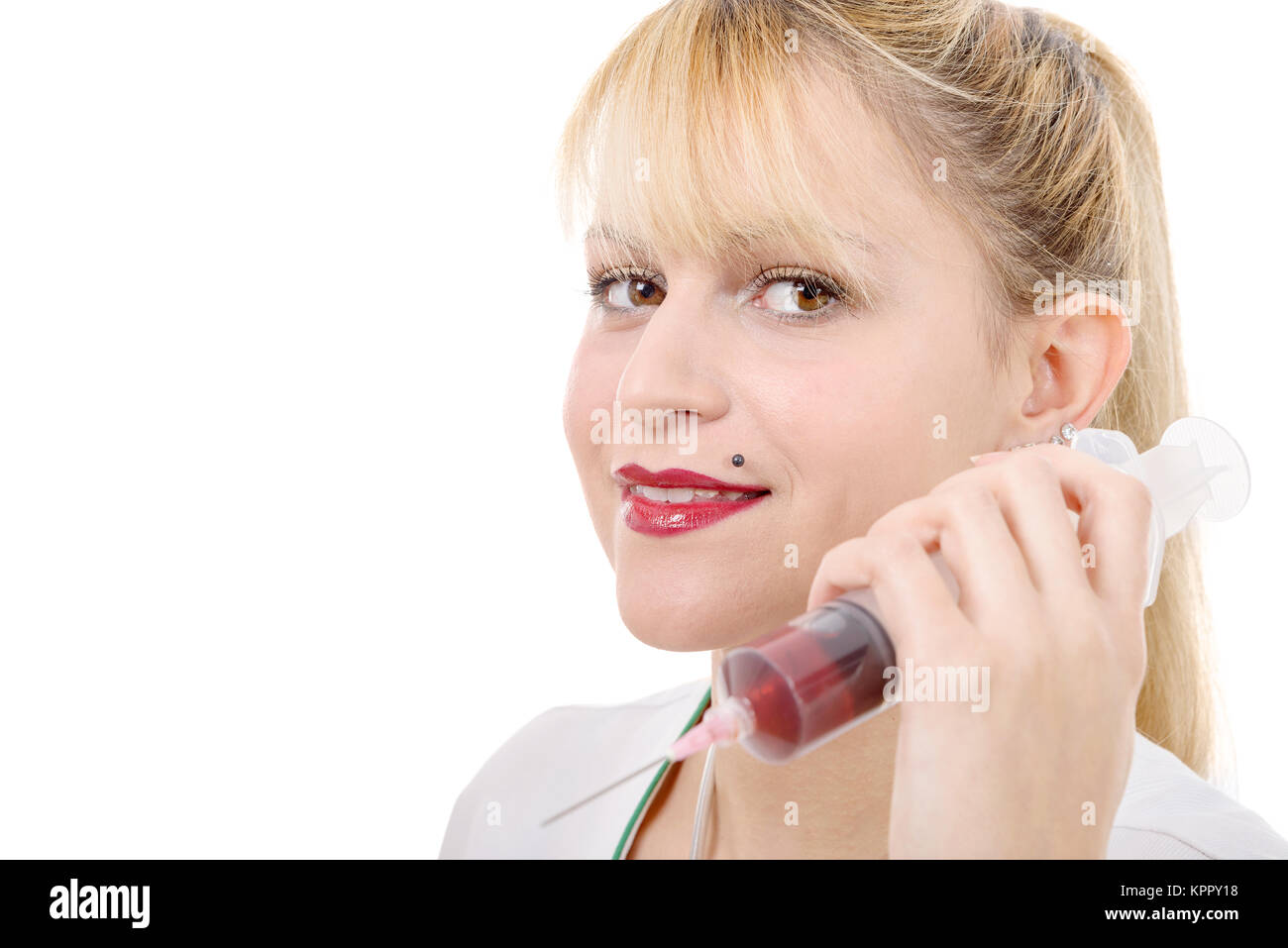Happy smiling young female doctor with syringe Stock Photo - Alamy