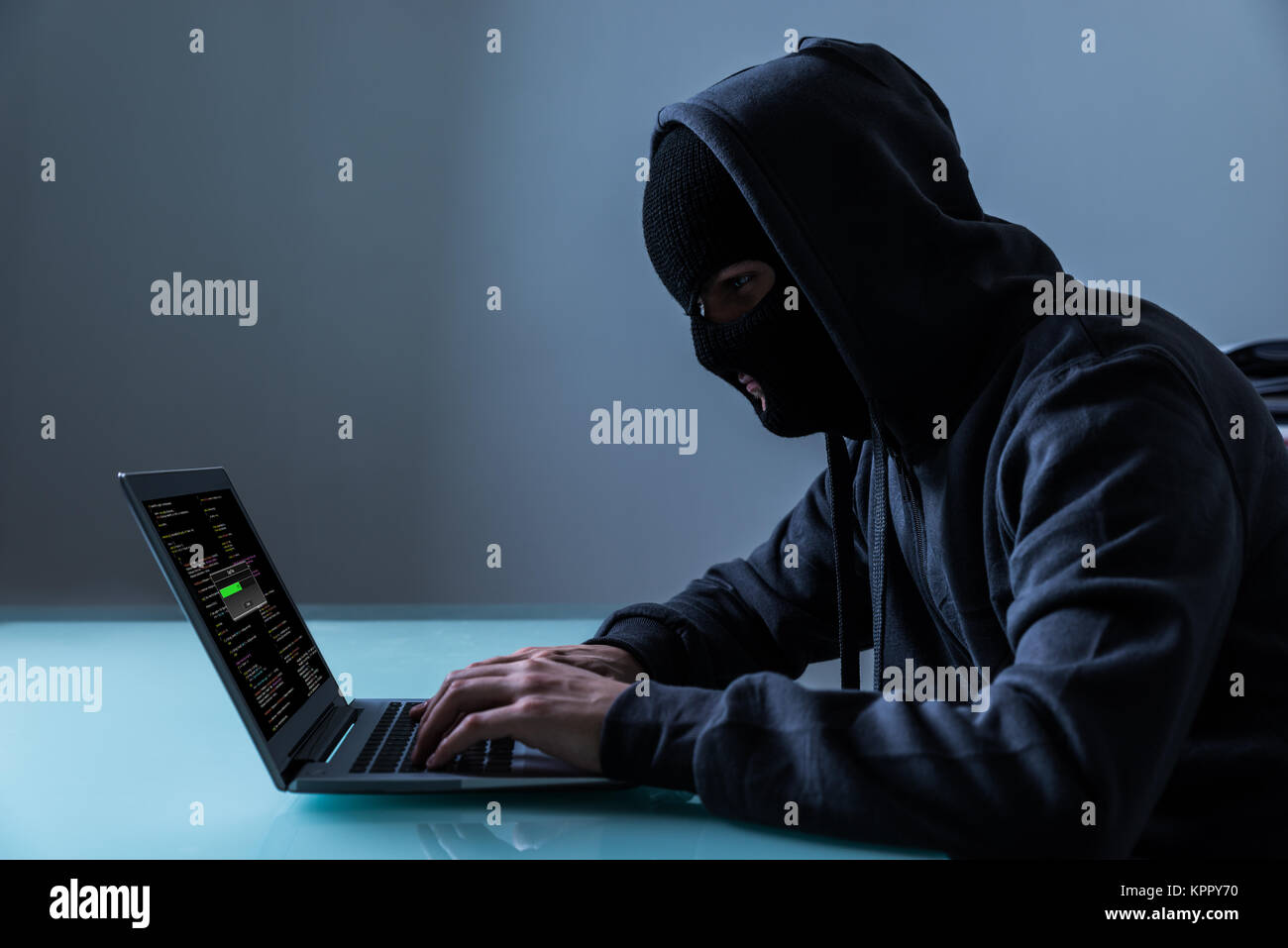 Hacker Stealing Information From Laptop Stock Photo - Alamy