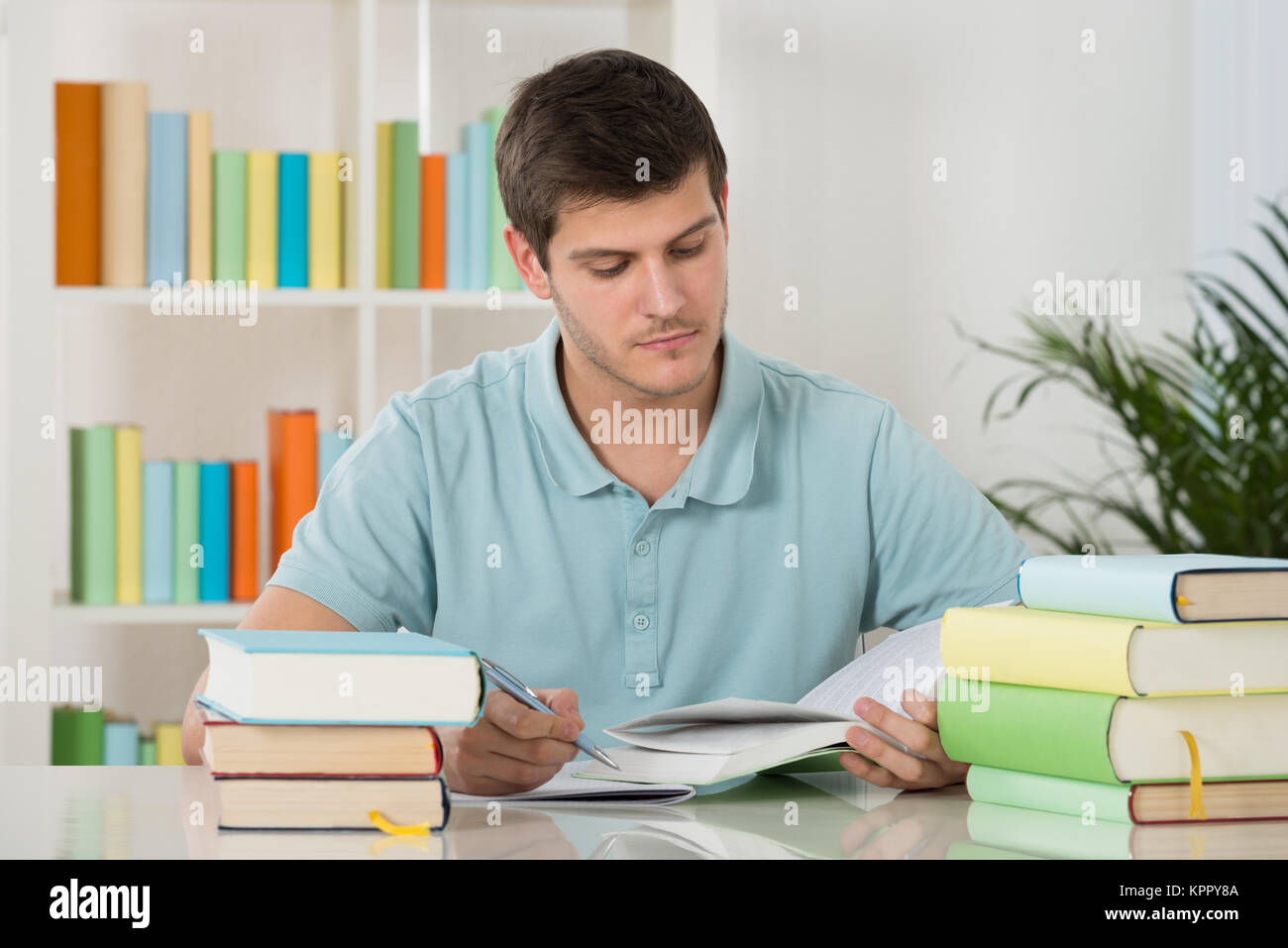 Man Reading Book Stock Photo - Alamy