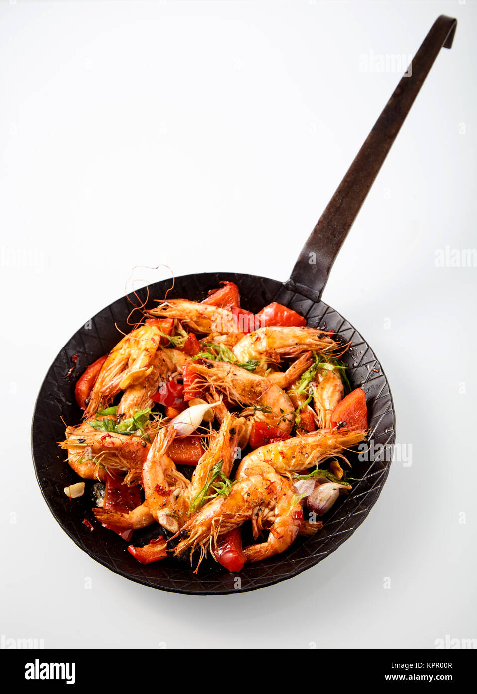 Gourmet grilled prawns in a spicy seafood appetizer seasoned with fresh ...