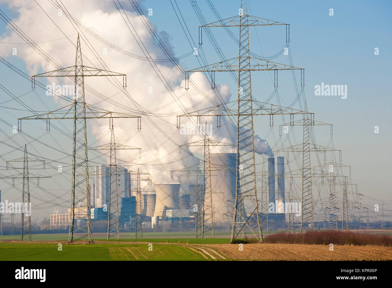 Germany, powerlines near Bergheim, in the background the brown coal ...