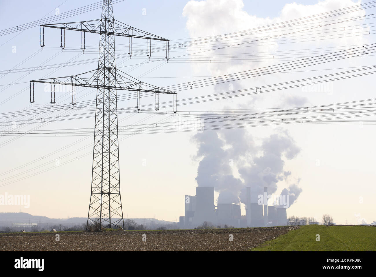 Germany, powerlines near Bergheim, in the background the brown coal ...