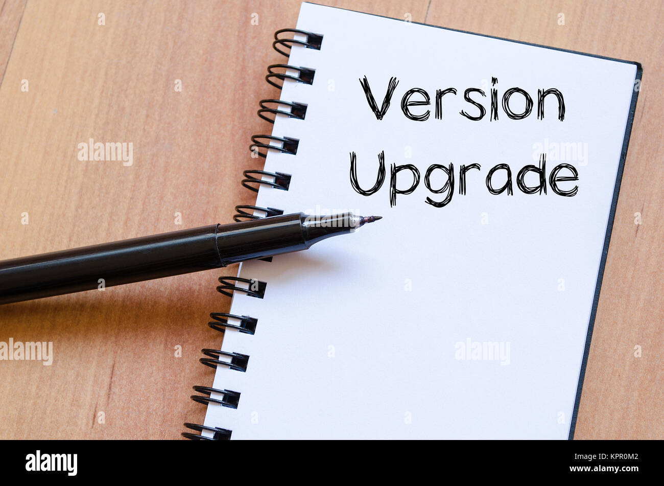 Version upgrade write on notebook Stock Photo - Alamy